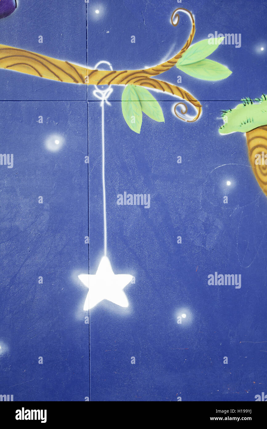 Star drawn on urban wall tree, symbol Stock Photo - Alamy