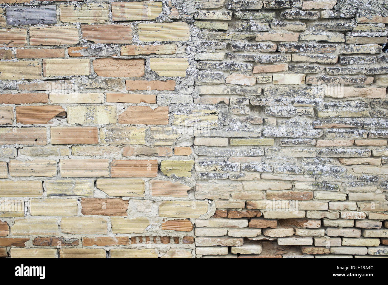 Dirty brick smashed into urban building Stock Photo - Alamy