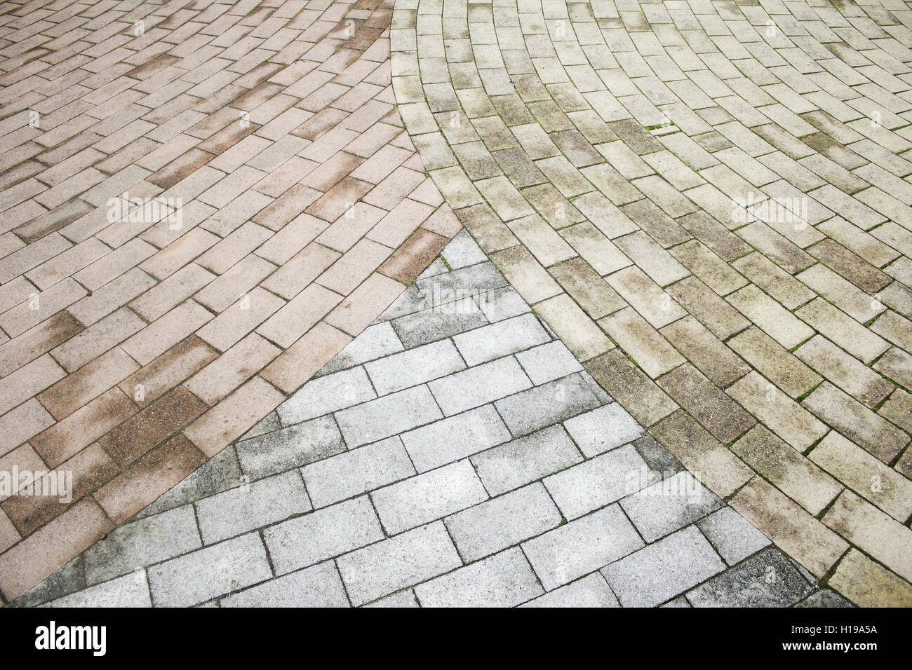 Tiles with curves in urban street decoration Stock Photo - Alamy