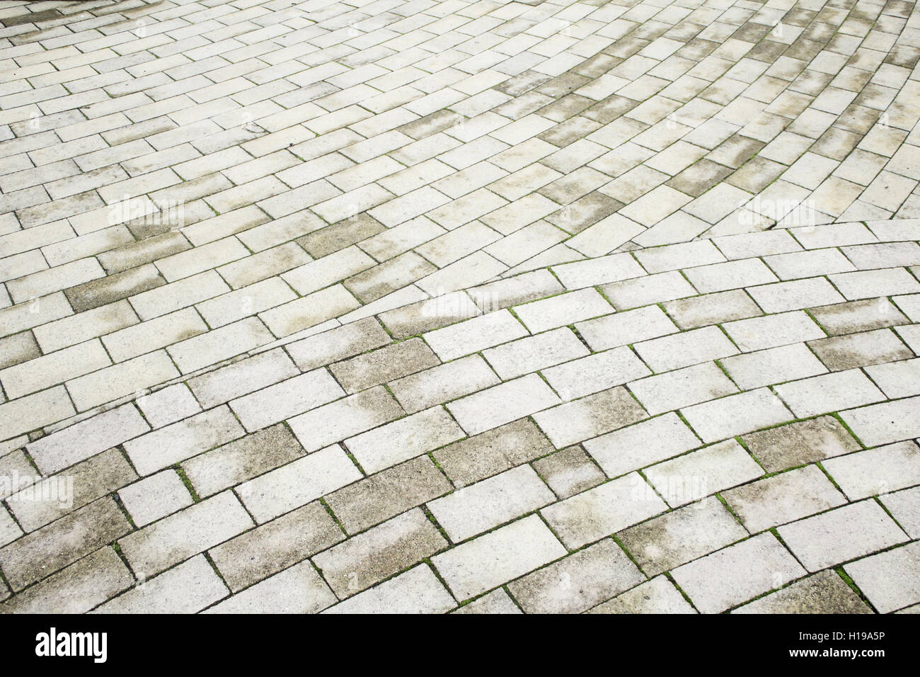 Tiles with curves in urban street decoration Stock Photo - Alamy