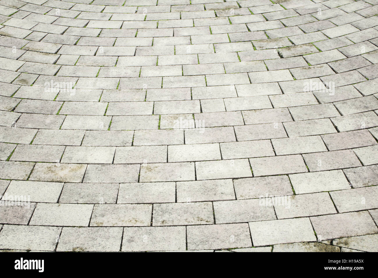Tiles with curves in urban street decoration Stock Photo - Alamy