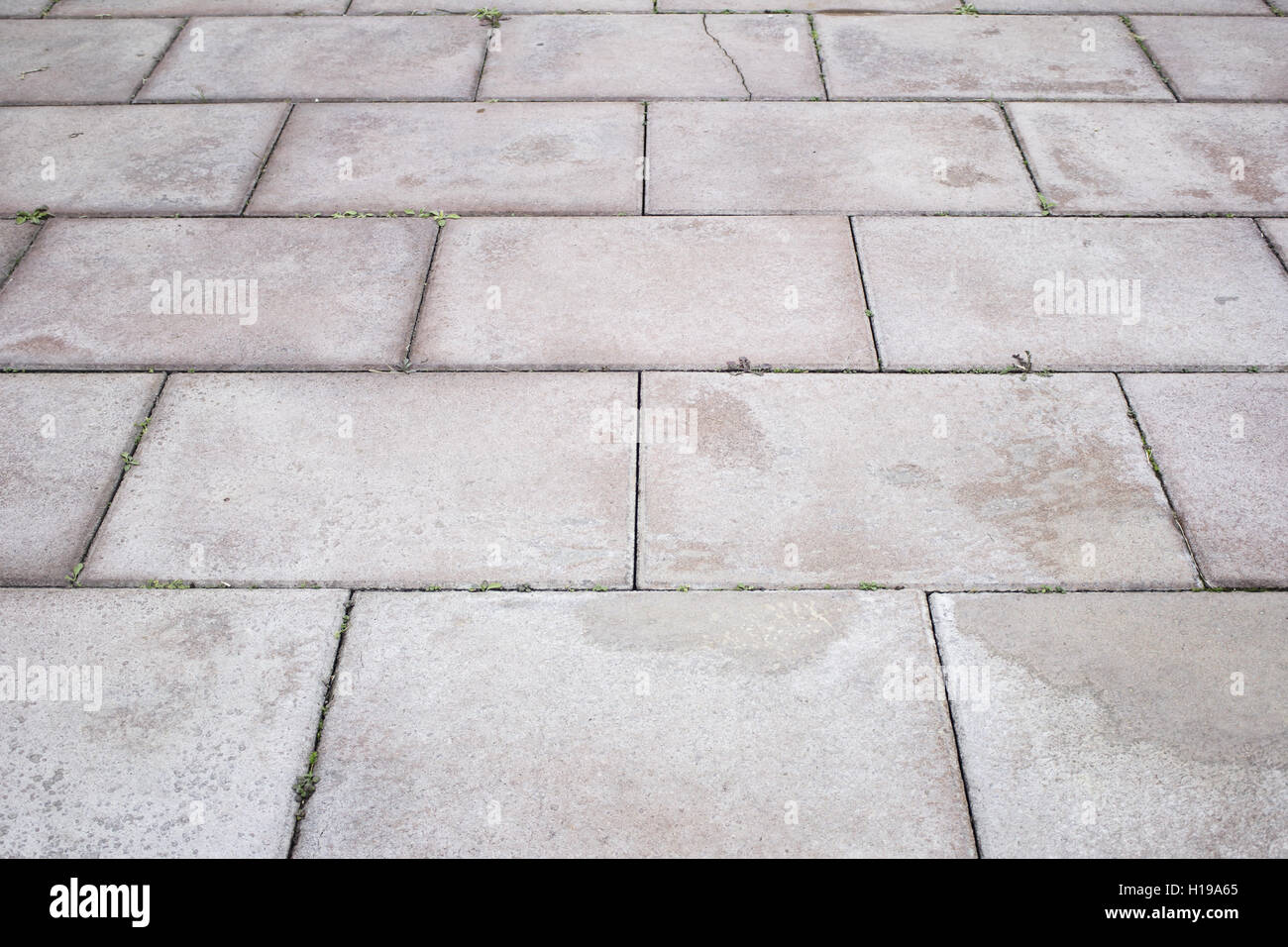 Horizontal floor tiles in urban street Stock Photo - Alamy