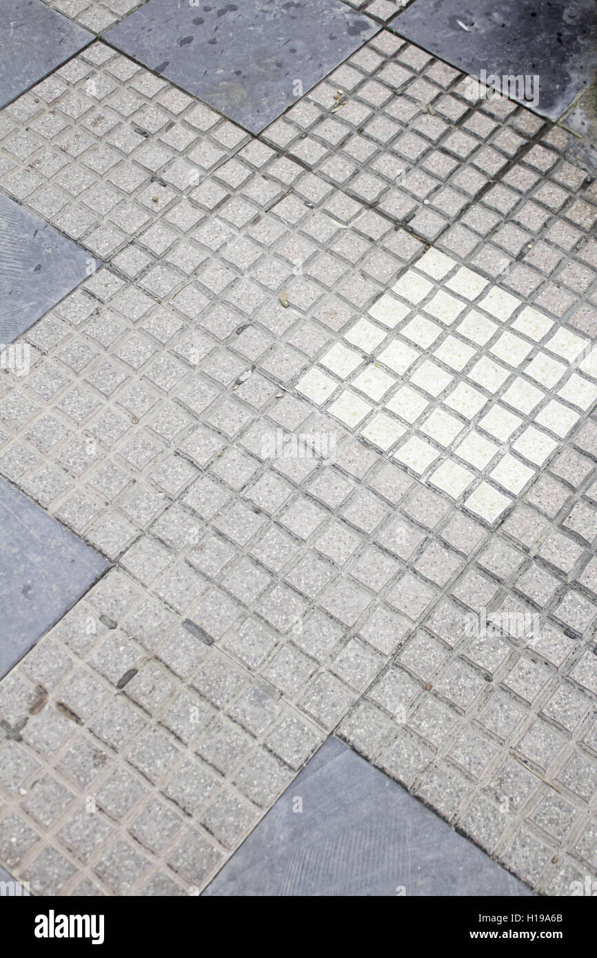 Horizontal floor tiles in urban street Stock Photo - Alamy