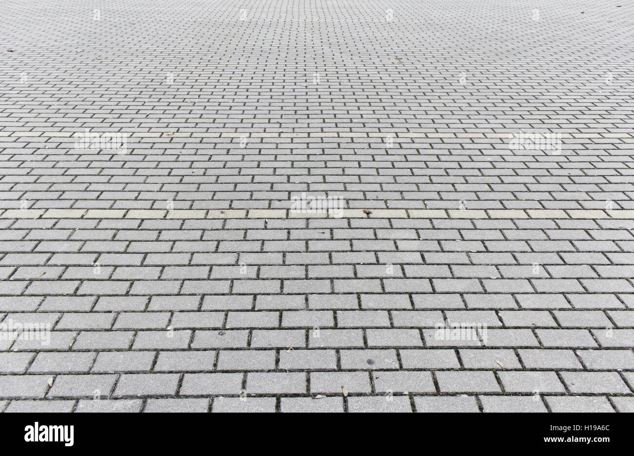 Horizontal floor tiles in urban street Stock Photo - Alamy