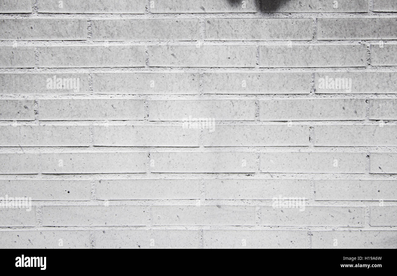 Dark gray bricks in urban building, construction Stock Photo - Alamy