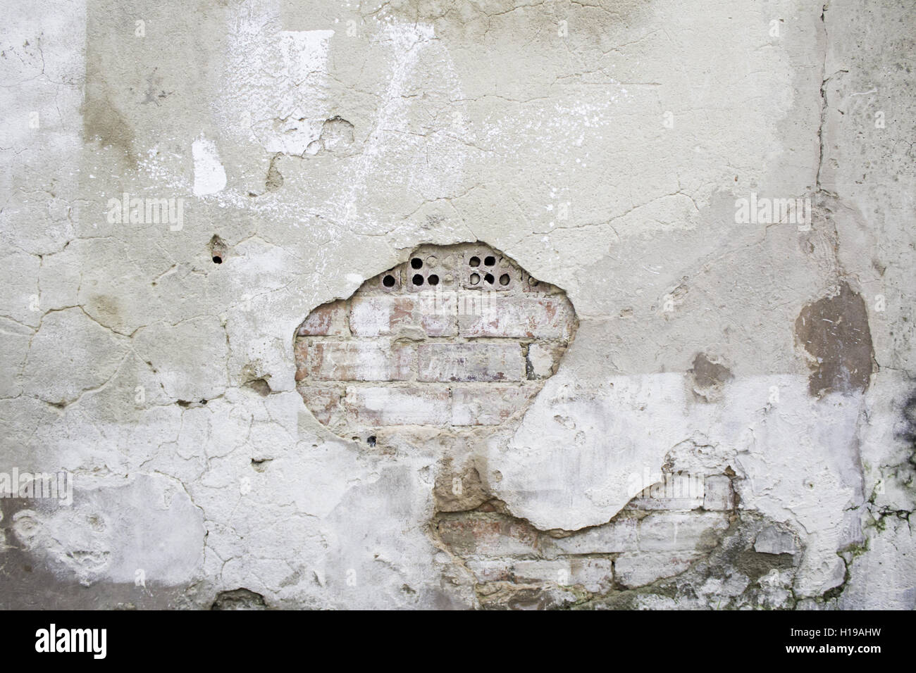 Gray wall destroyed old house construction Stock Photo - Alamy