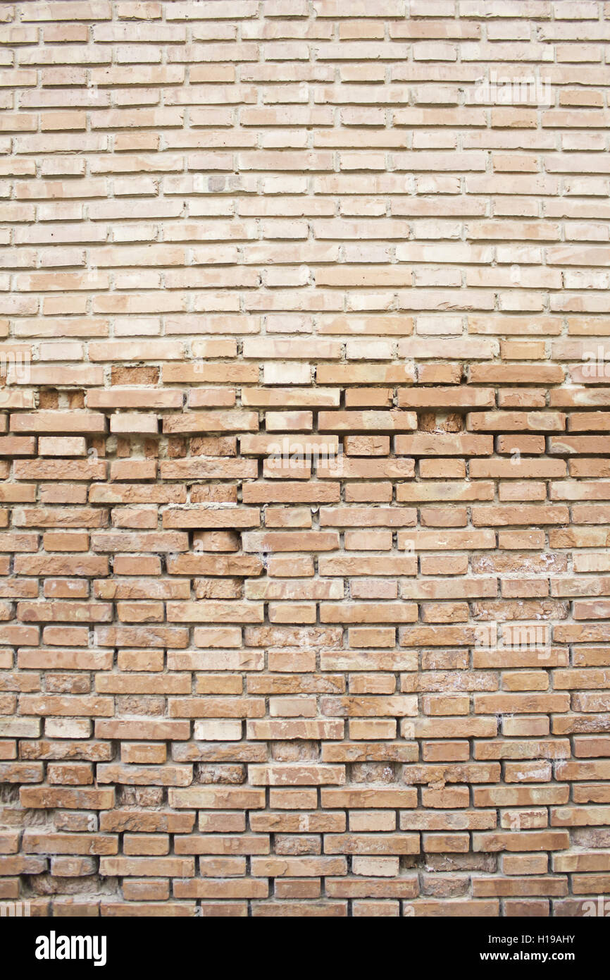 Old brick wall townhouse, construction Stock Photo - Alamy