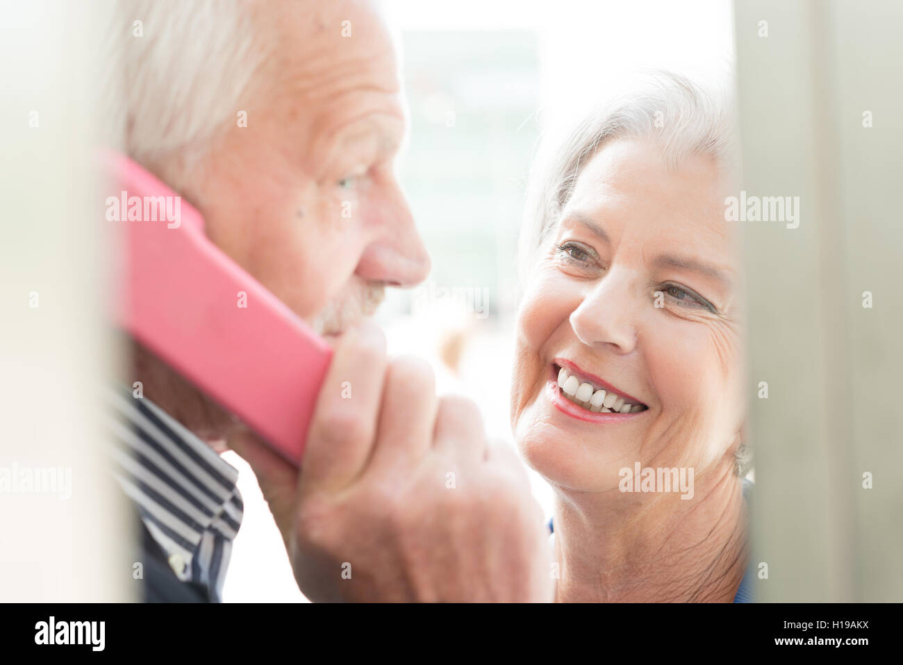 Senior couple call in a phone box Stock Photo - Alamy