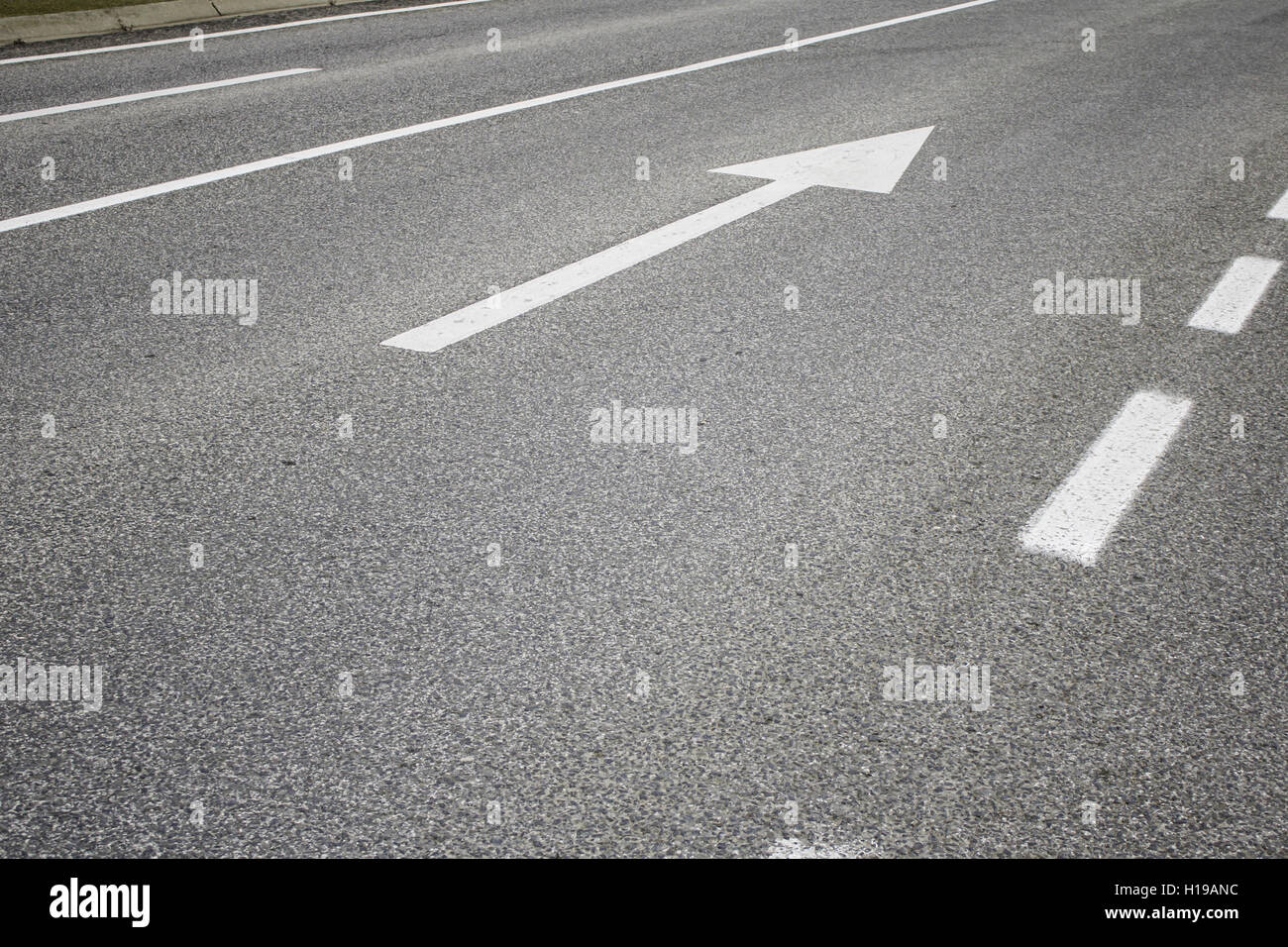 Address road with arrow and symbols Stock Photo - Alamy