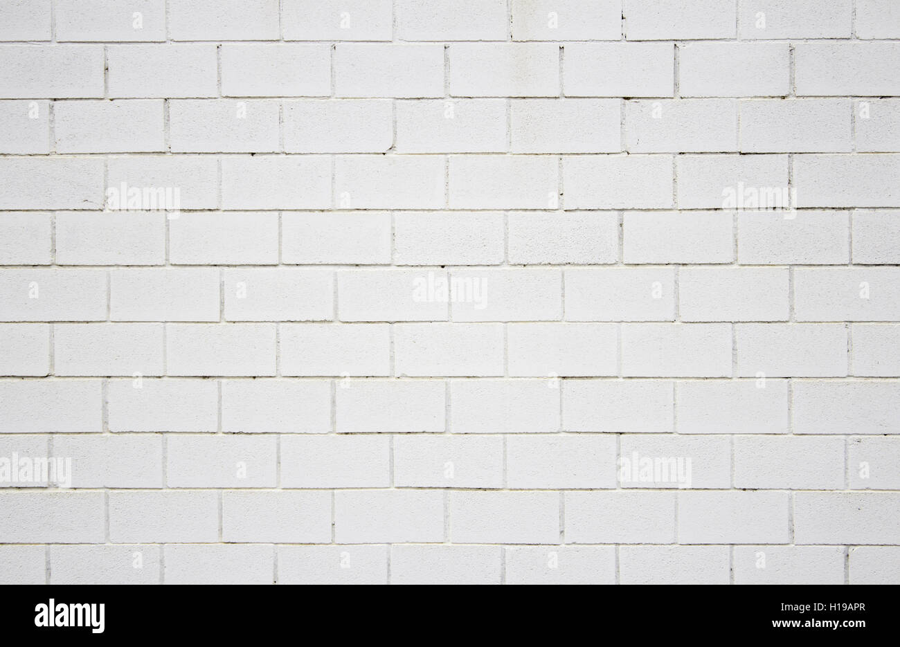 White brick wall urban street construction Stock Photo - Alamy