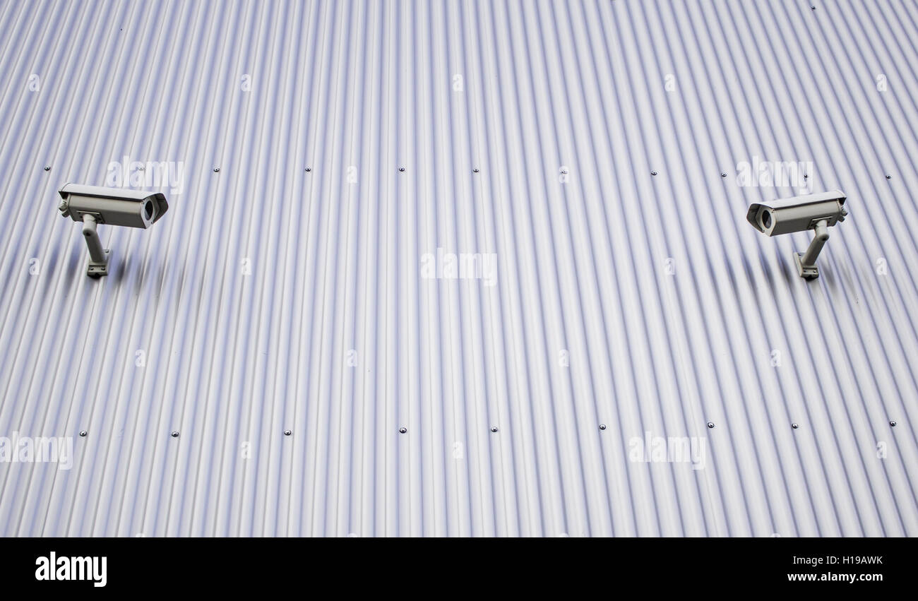 Security cameras in industrial building, business Stock Photo - Alamy