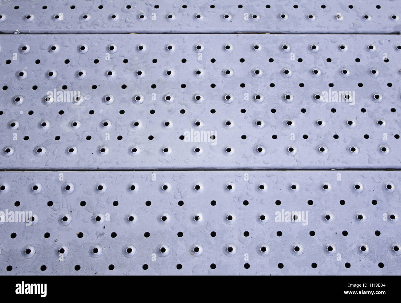 Metal industrial land in urban street Stock Photo - Alamy