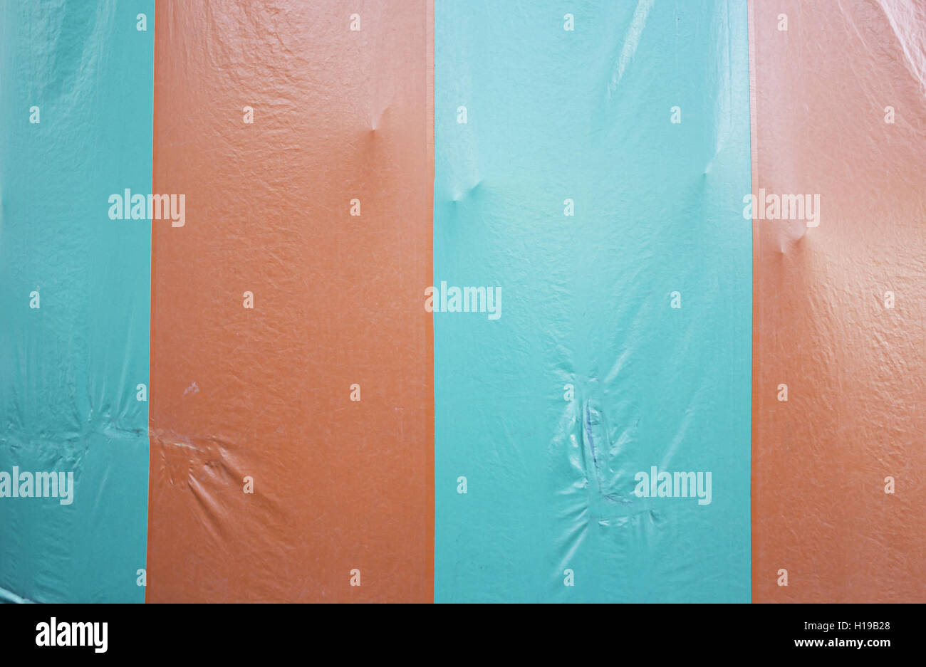 Wall with vertical lines of color, construction Stock Photo - Alamy