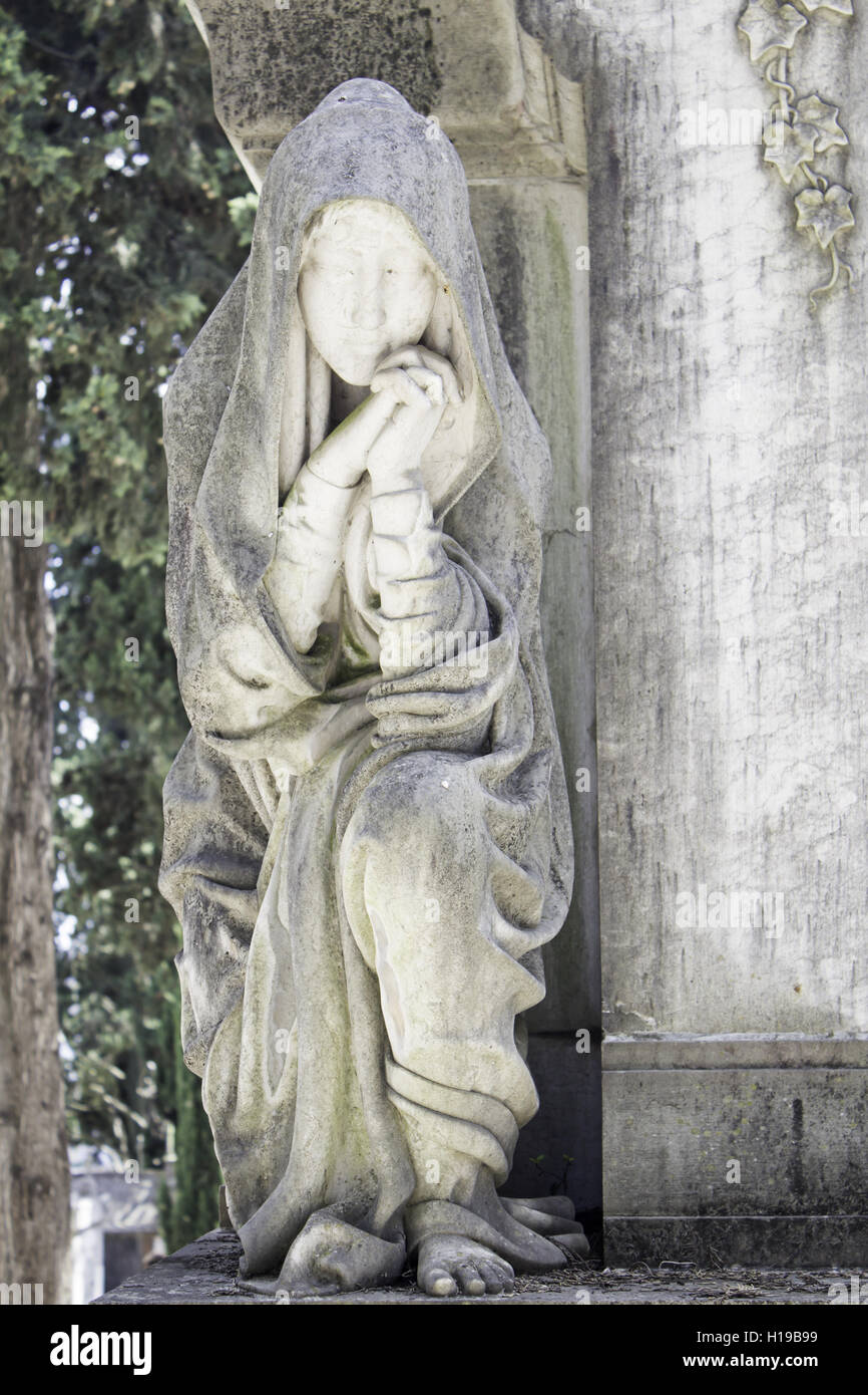 Stone woman over ancient tomb, religion Stock Photo - Alamy
