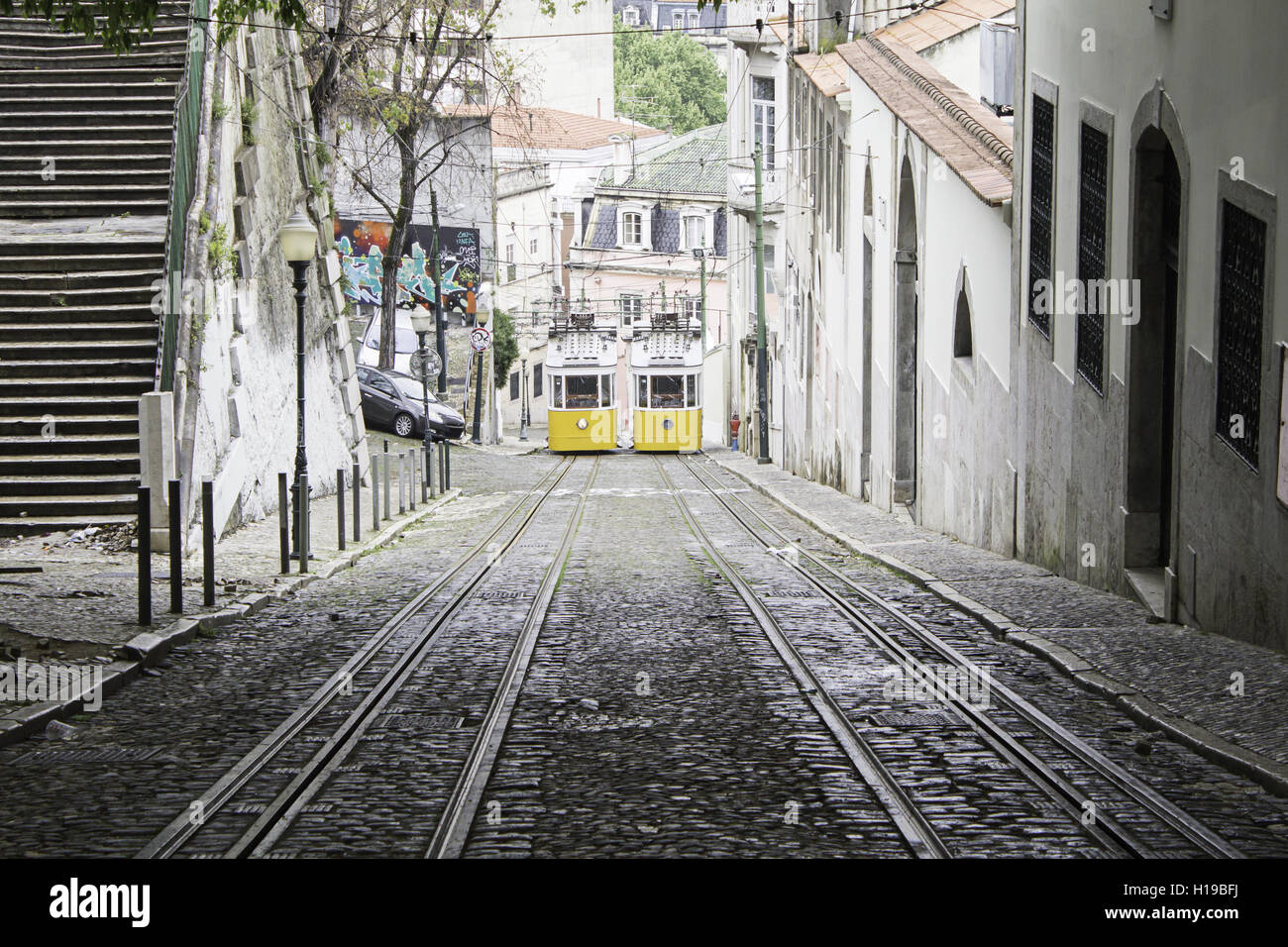 Tram in costs of urban road transport vehicle Stock Photo - Alamy