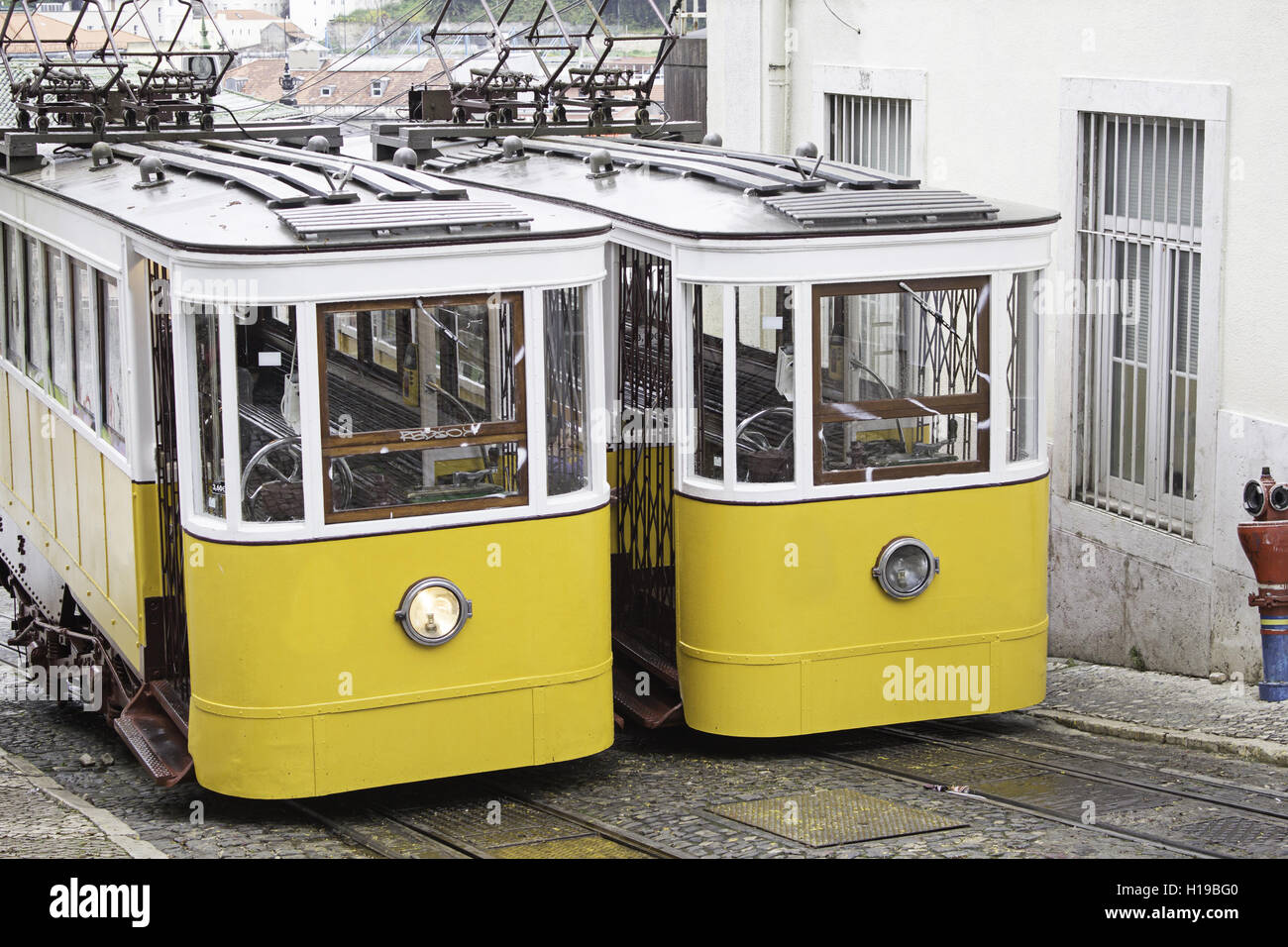 Tram in costs of urban road transport vehicle Stock Photo - Alamy