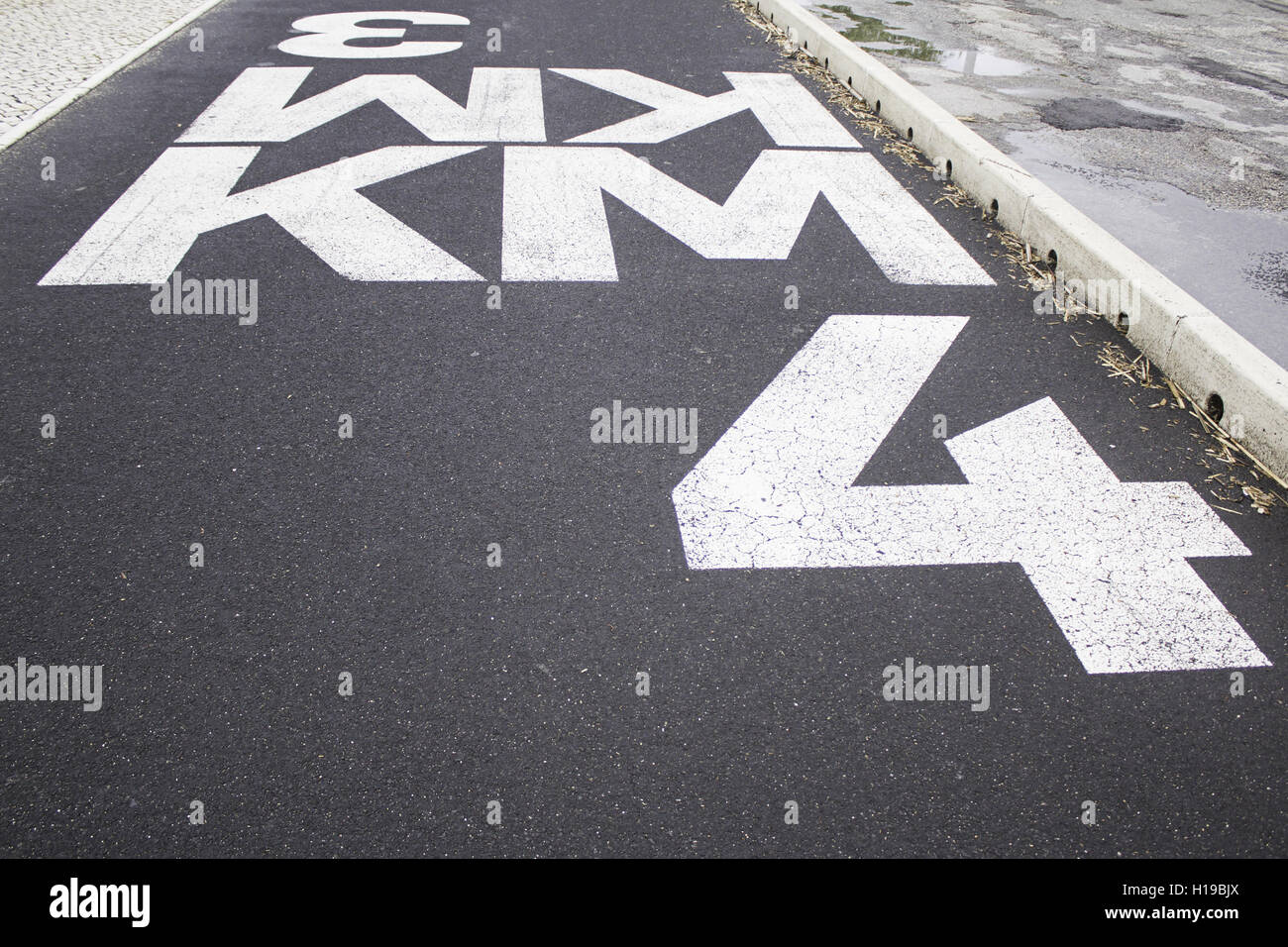 Sign kilometer in urban road lisbon, traffic Stock Photo - Alamy