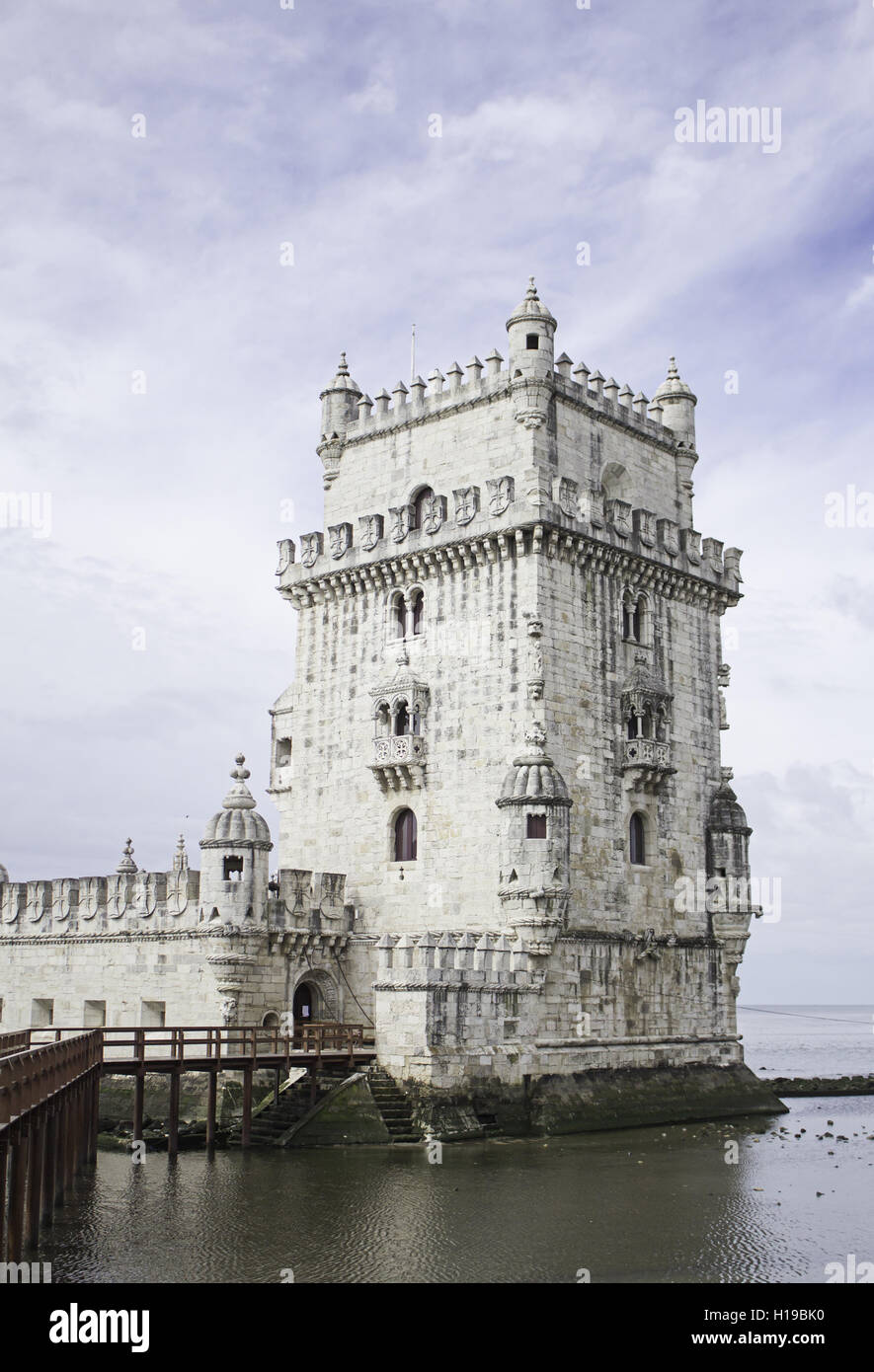Belem Tower with blue sky and sea, construction Stock Photo - Alamy