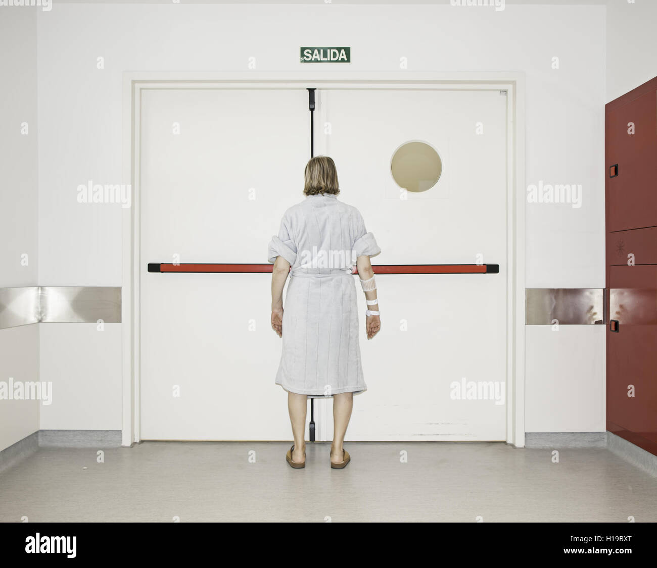Sick in hospital walk through the halls, treatment Stock Photo - Alamy