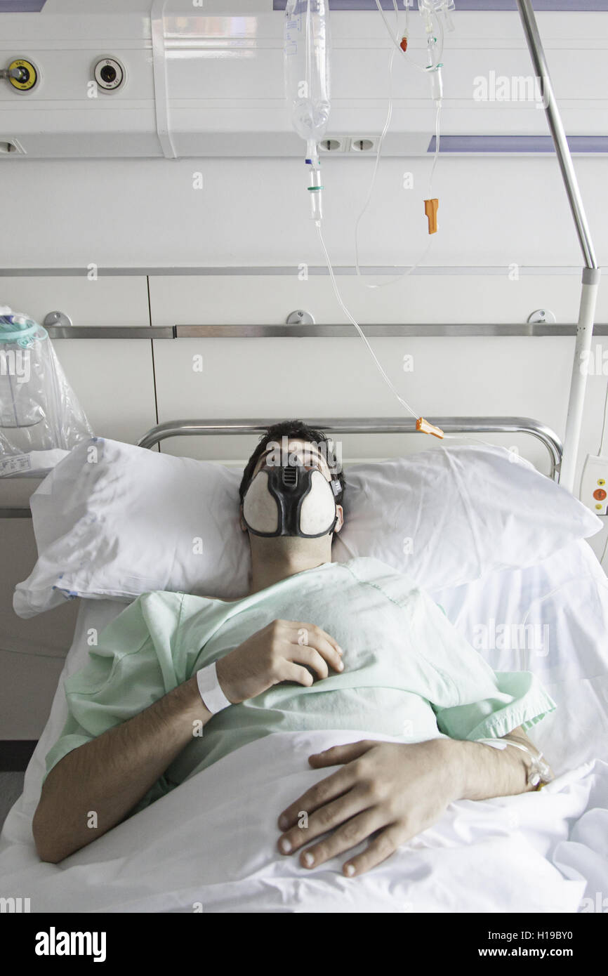 Patient infected with mask in hospital, sick Stock Photo - Alamy