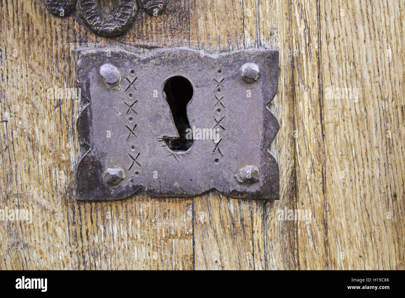Old iron lock on wooden door, construction Stock Photo - Alamy