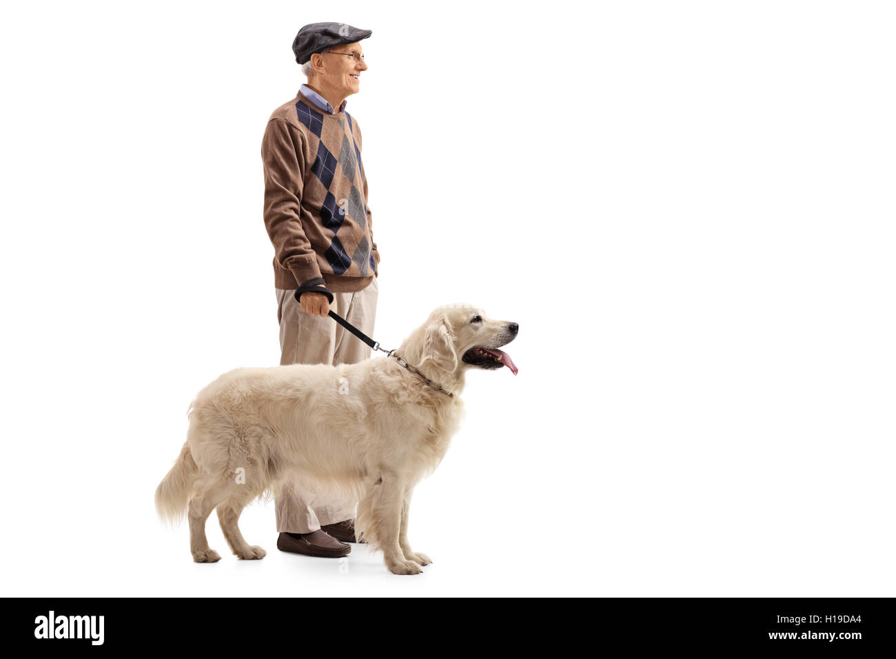 Full length profile shot of an elderly man and his dog isolated on ...