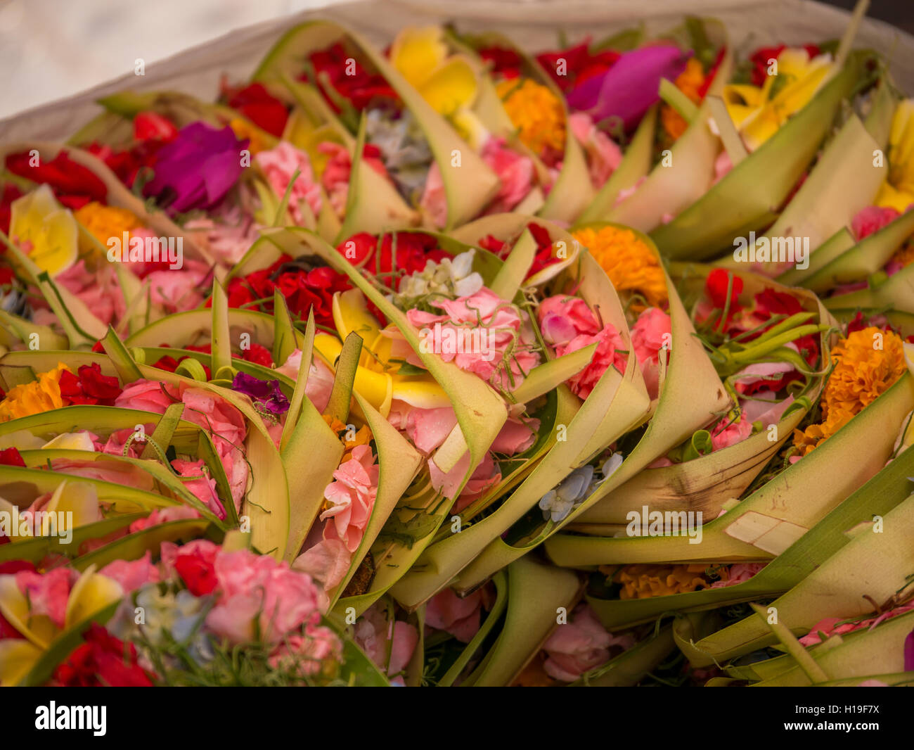 Traditional balinese offerings to gods in Bali with flowers and ...