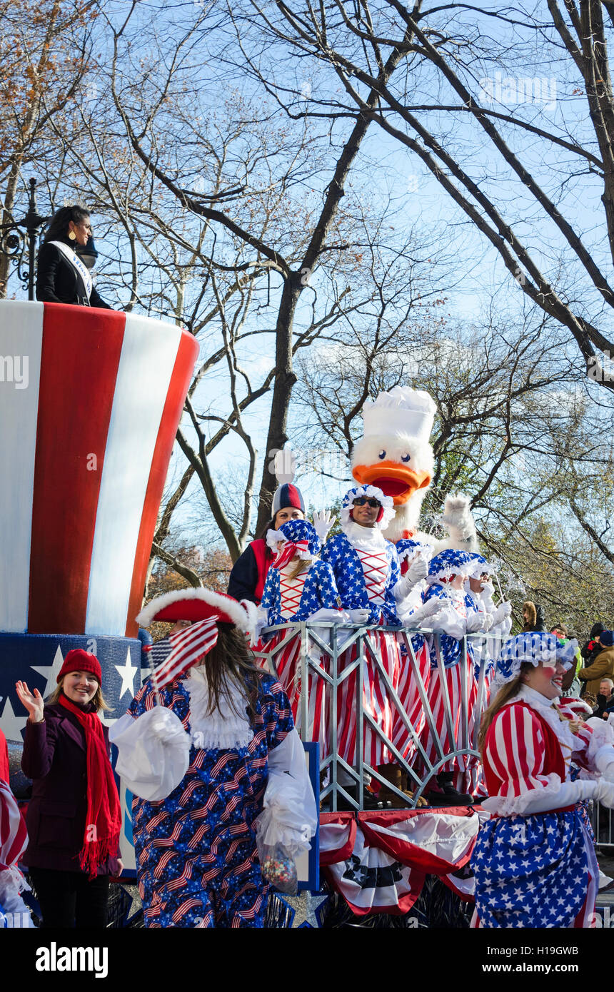 Nina Davuluri, Miss America, waves from the 'Uncle Sam's Top Hat' float ...