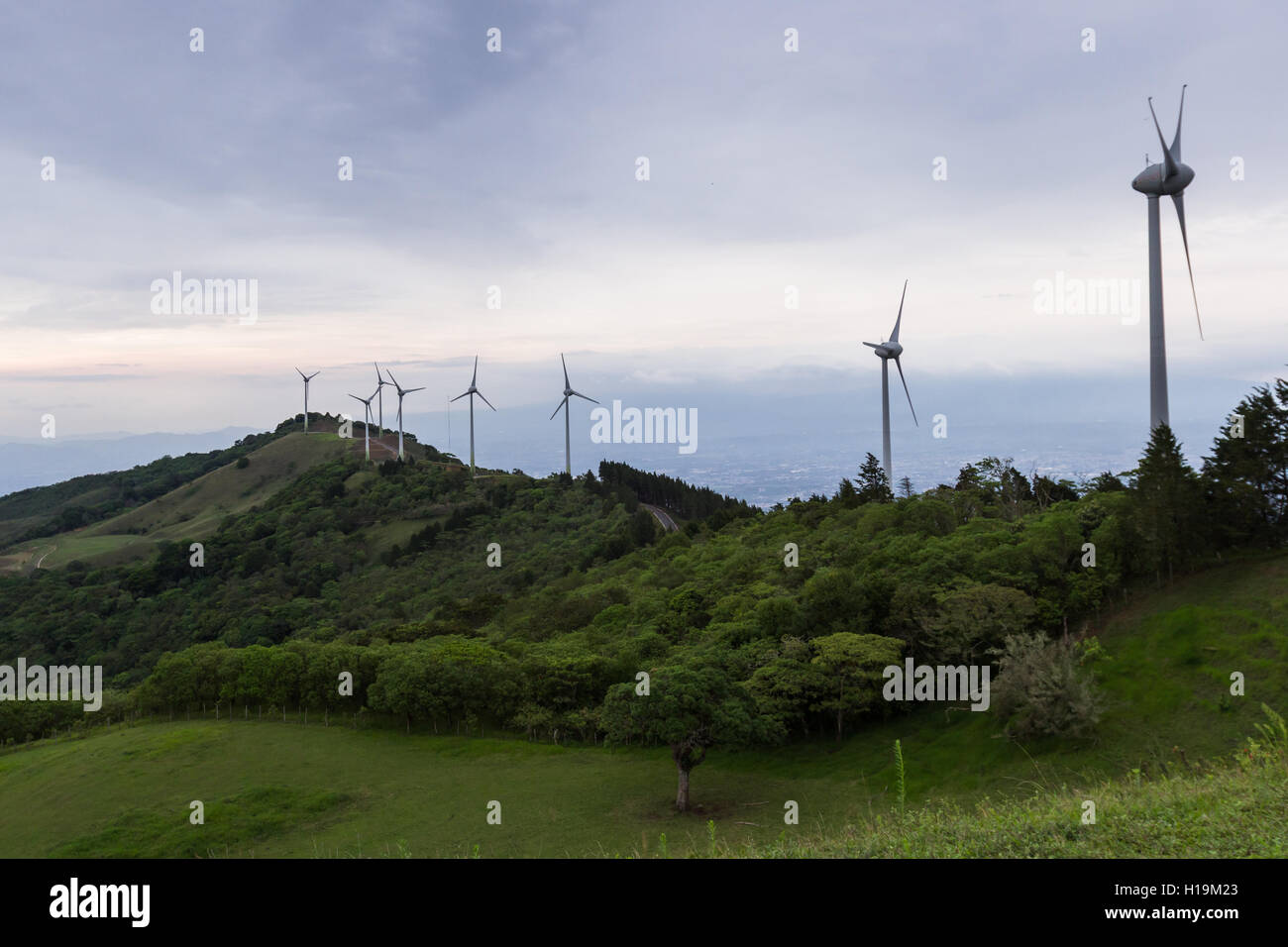 wind turbines on top of a mountain in the central valley of Costa Rica ...