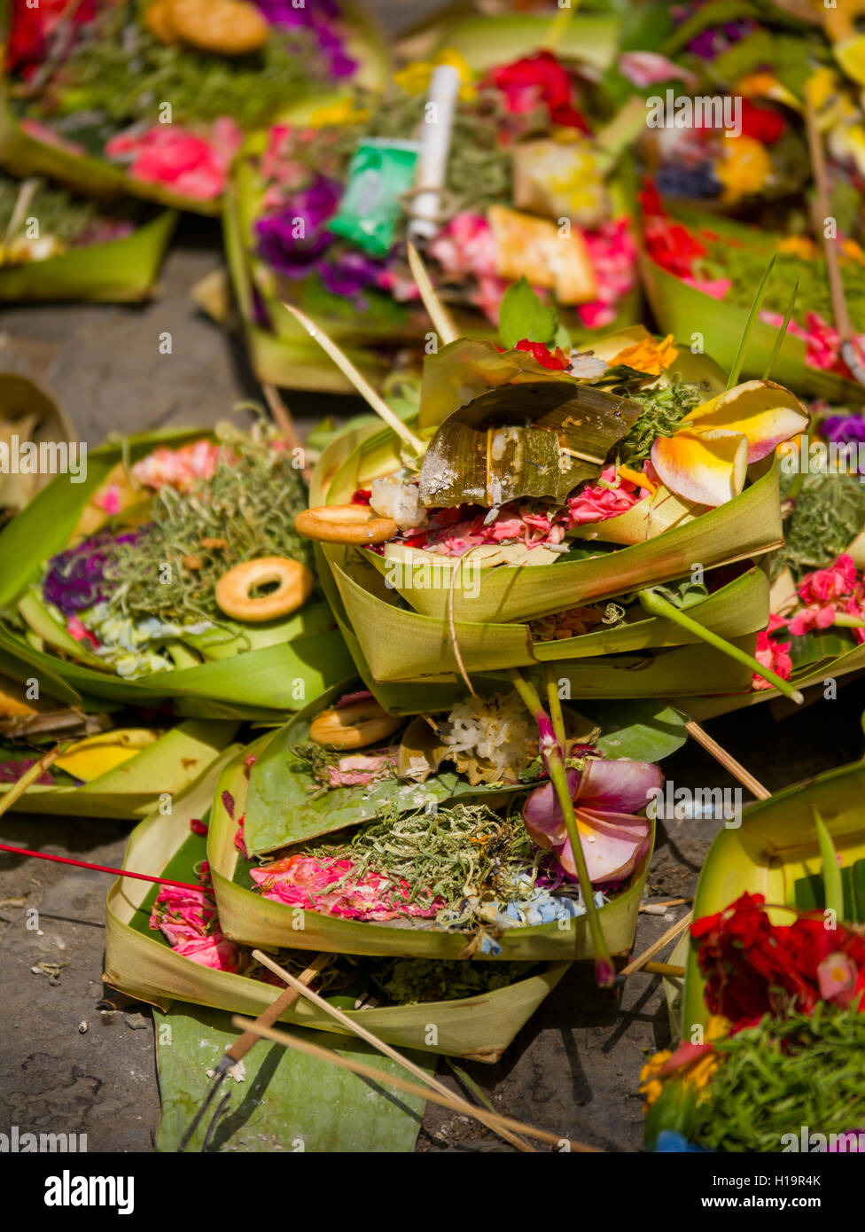 Traditional balinese offerings to gods in Bali with flowers and ...
