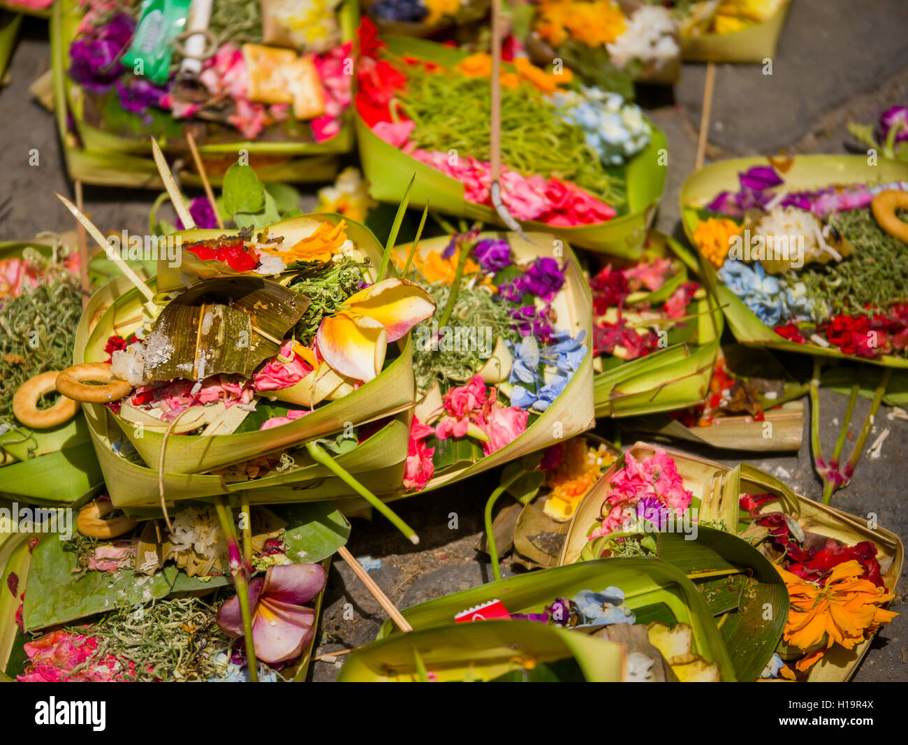 Traditional balinese offerings to gods in Bali with flowers and ...