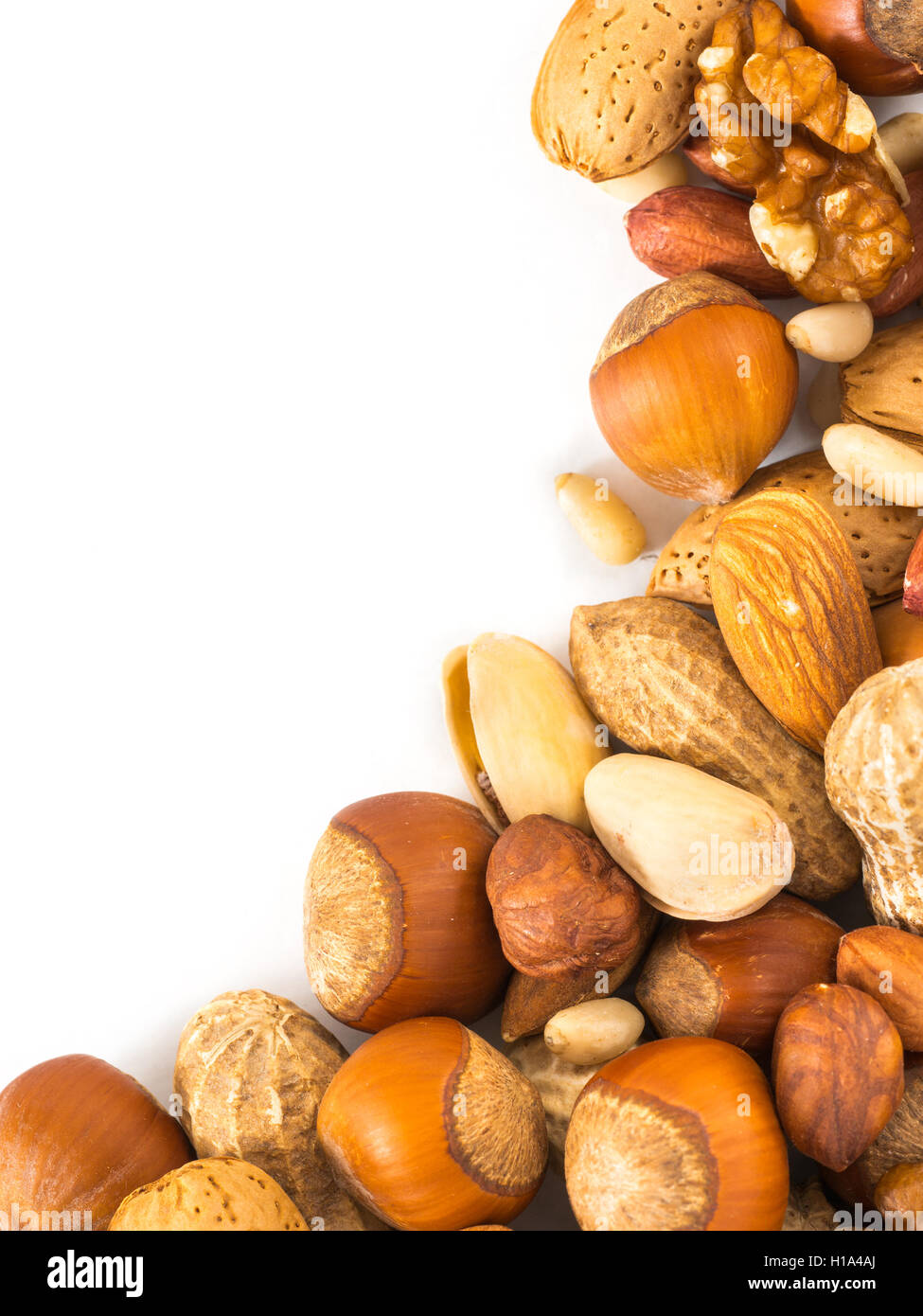 Background of mixed nuts with copy space Stock Photo - Alamy