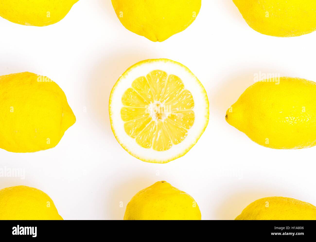 Composition with nine Lemons, one of them cut in half, photo Flat Lay ...