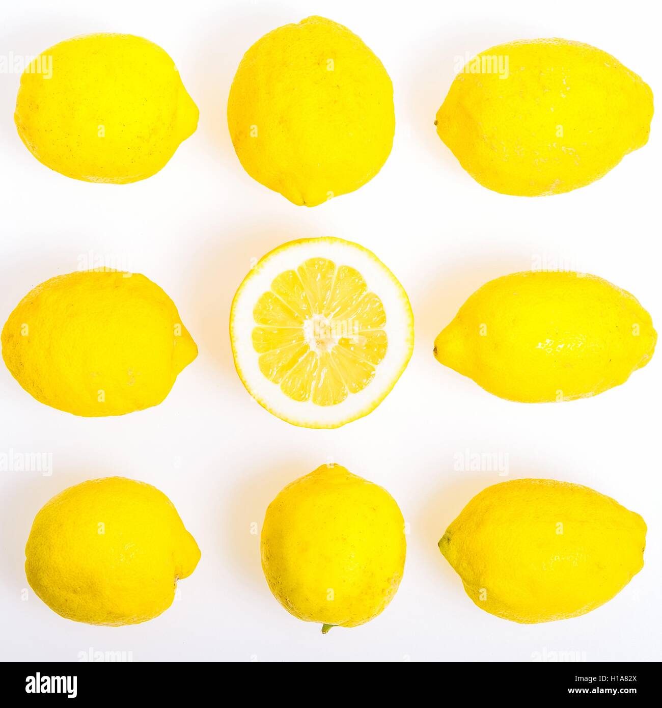 Composition with nine Lemons, one of them cut in half, photo Flat Lay ...