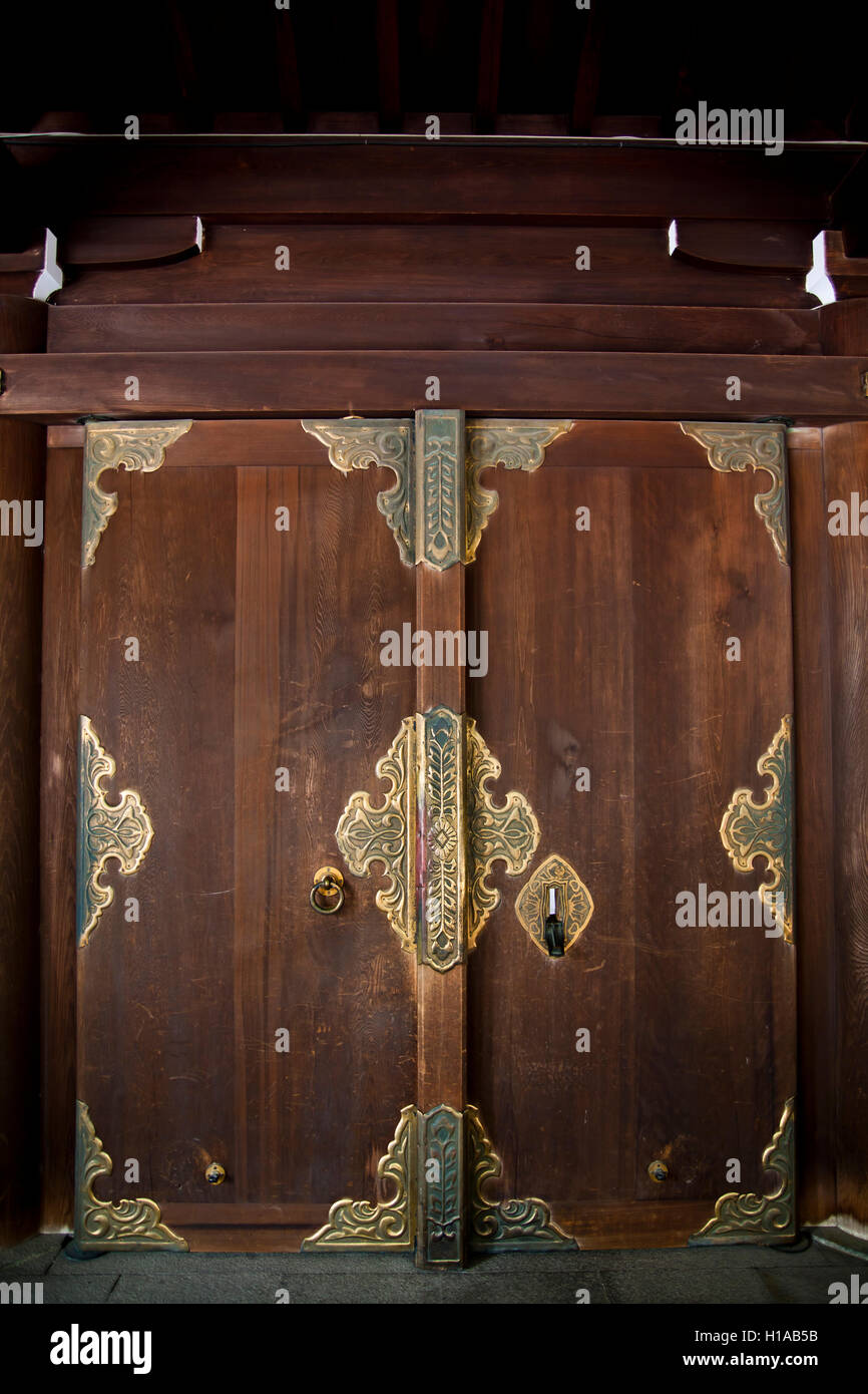 Ornate wooden door detail in the Meiji Shrine, Tokyo, Japan Stock Photo ...