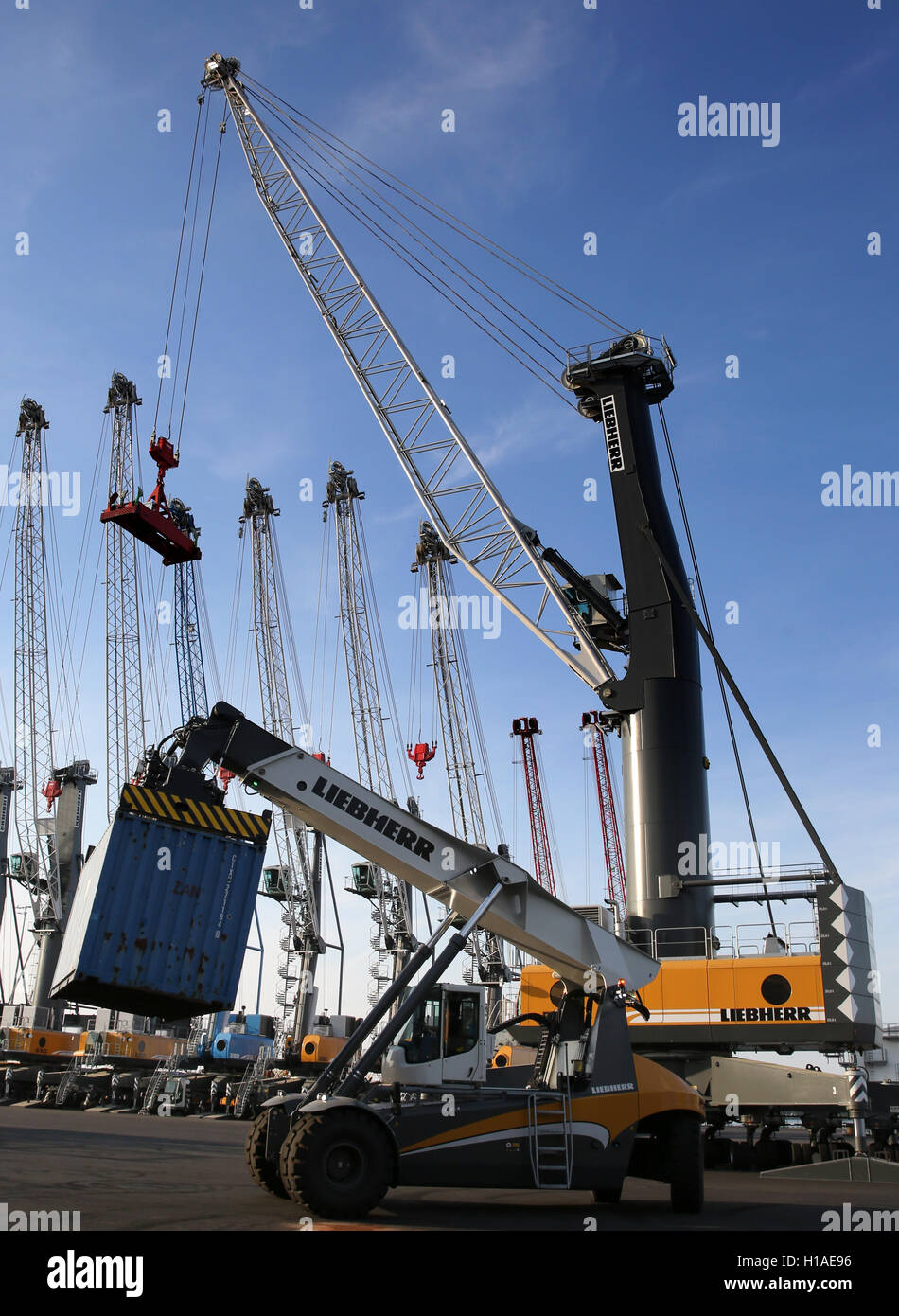 Rostock, Germany. 22nd Sep, 2016. Mobile harbor cranes and reach ...
