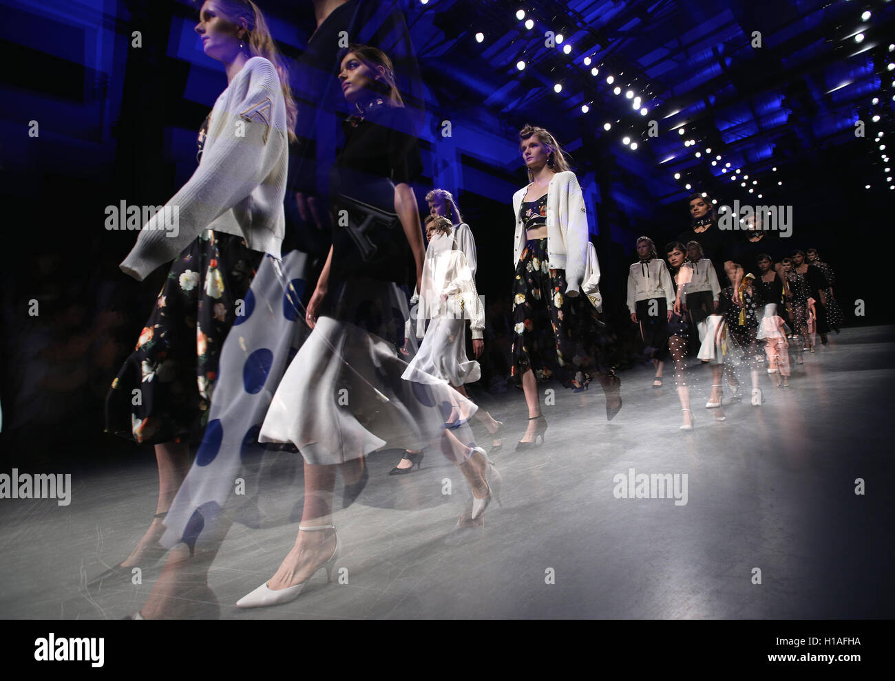 Milan, Italy. 22nd Sep, 2016. The multiple exposure photo shows models ...
