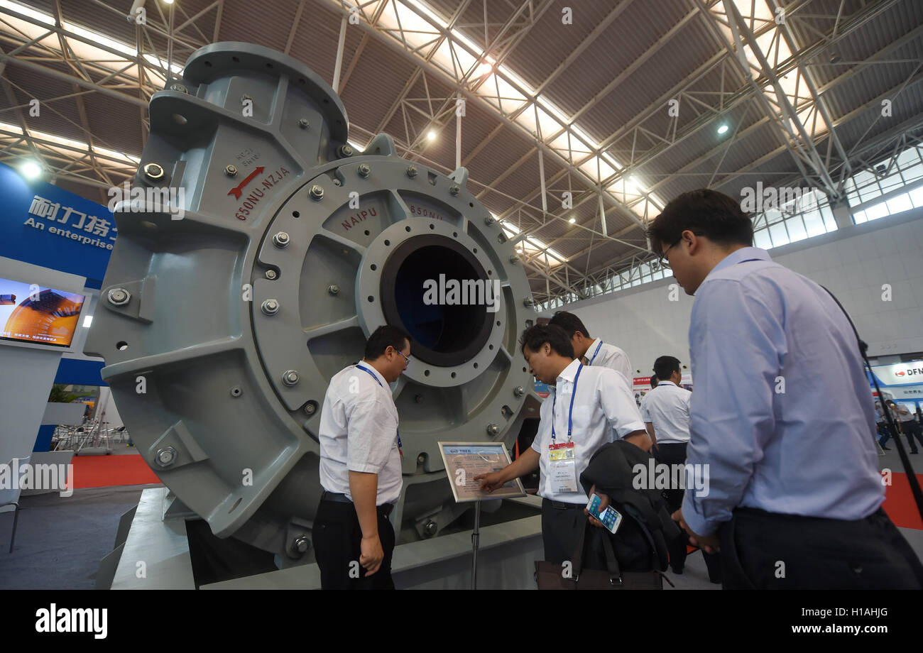 Tianjin, China. 23rd Sep, 2016. Visitors look at a mining equipment at ...