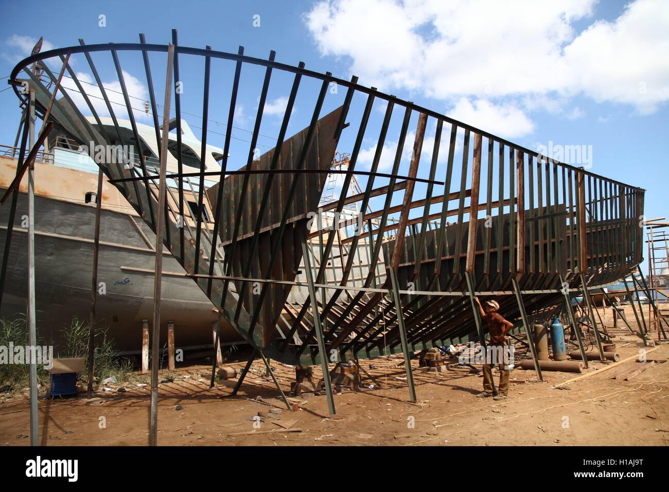 Beheira, Egypt. 22nd Sep, 2016. A man works at a shipbuilding factory ...