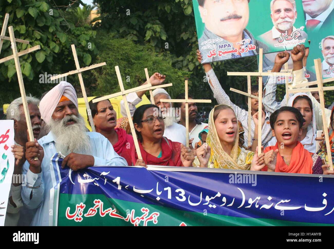 Muslim League-N minority wing members are holding a demonstration for ...