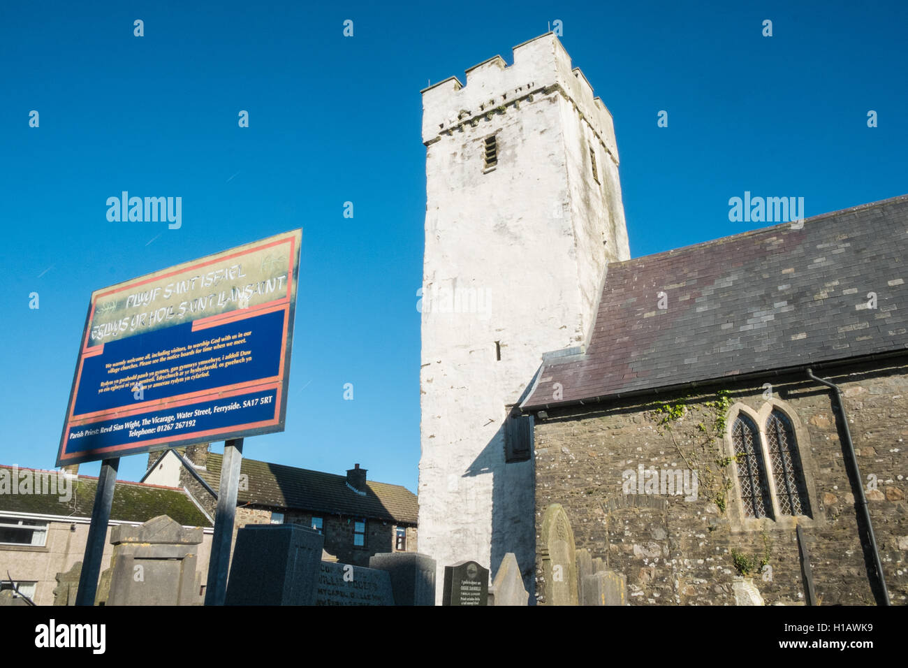 Ancient church and bell tower in centre of village of Llansaint,a ...
