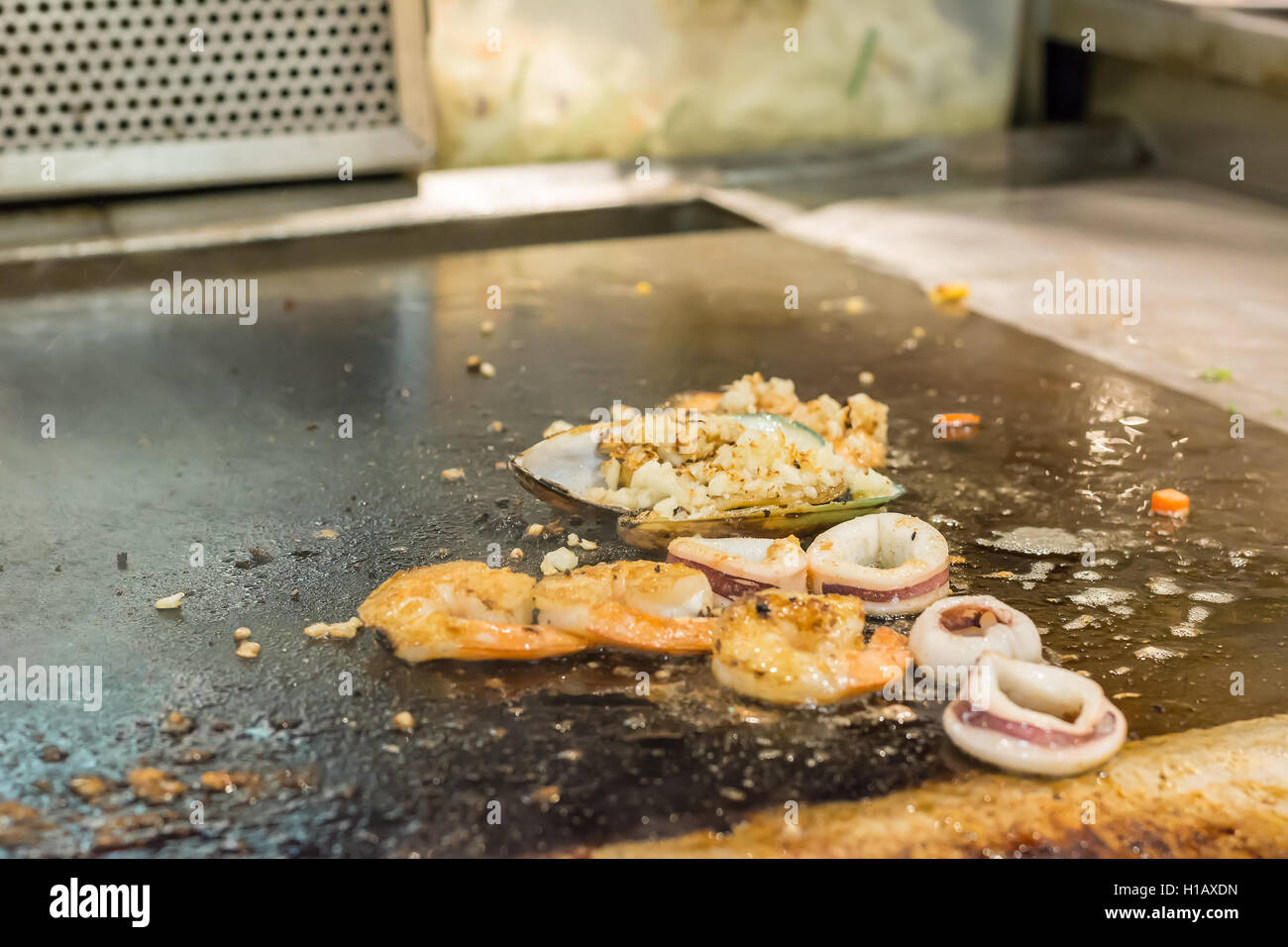 Cooking Seafood in restaurant Stock Photo - Alamy