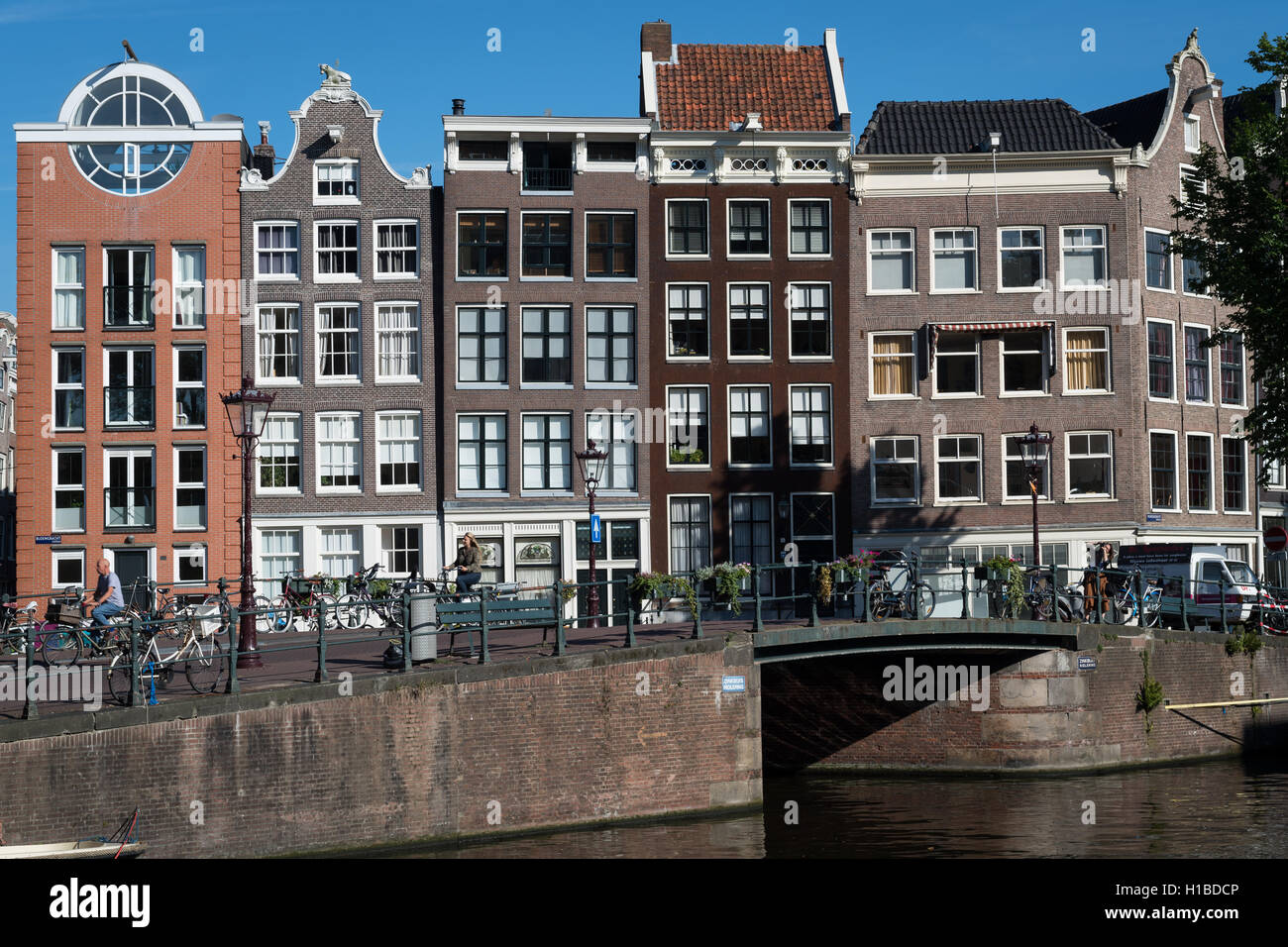 Classic canal-side buildings in Amsterdam Stock Photo - Alamy