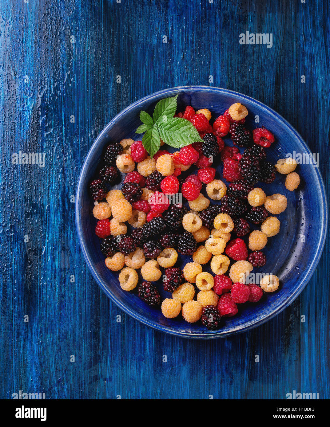 Heap of colorful raspberries Stock Photo - Alamy