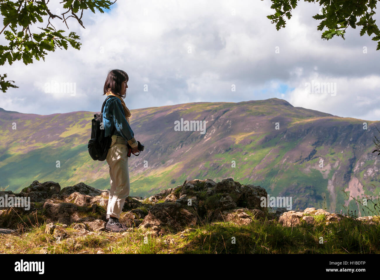 Female tourist at Surprise View, near Keswick, Lake District, Cumbria ...