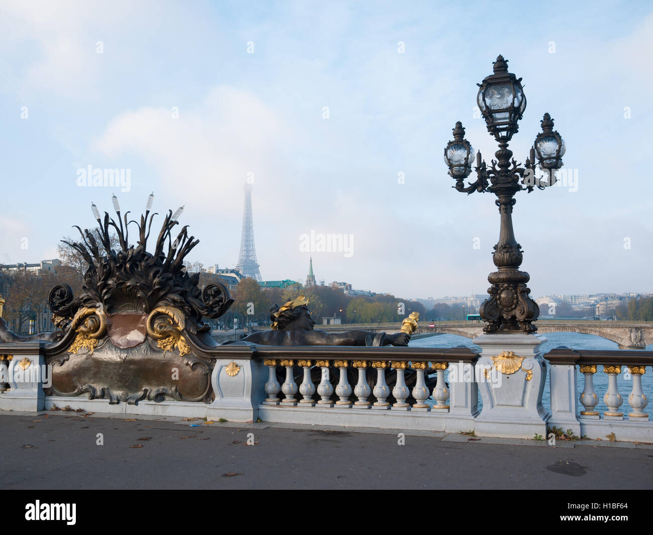 Street lantern on the Alexandre III Bridge against the Eiffel Tower in ...