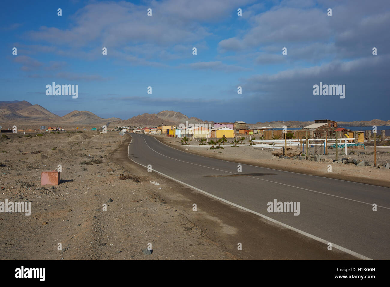 Pan American Highway (Route 5) running along the coast past the small ...