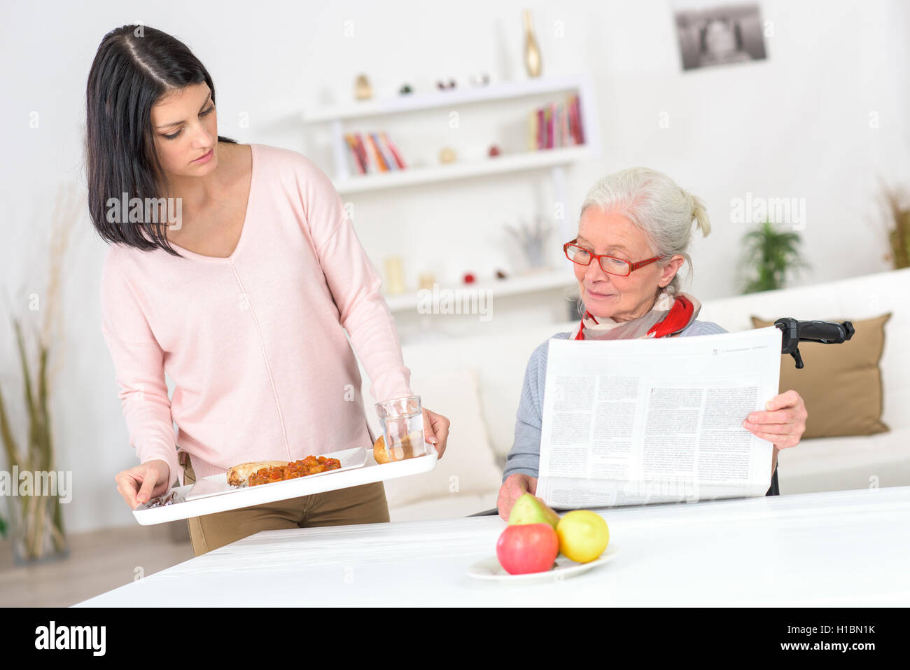 Care worker food disabled hi-res stock photography and images - Alamy
