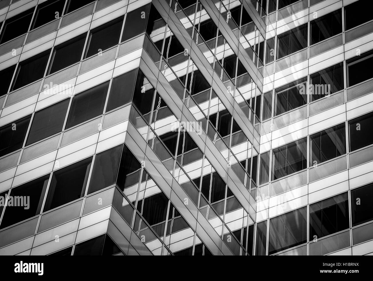 abstract photo of a modern glass building with crossing lines and ...