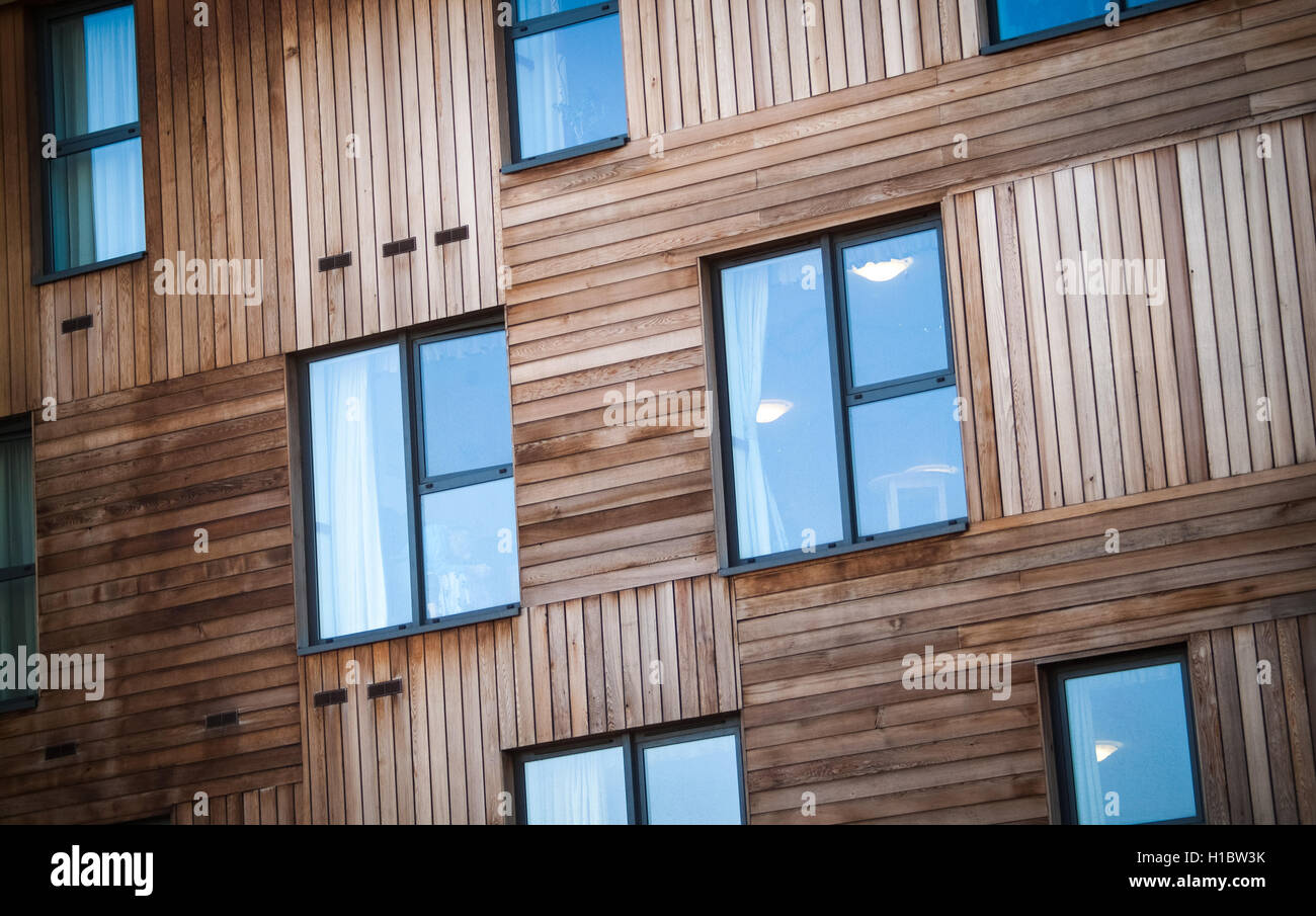 abstract photo of a wooden house exterior with a few windows Stock ...